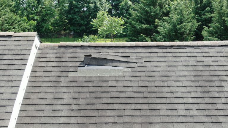 6 Signs Of Roof Storm Damage (And How To Fix It)